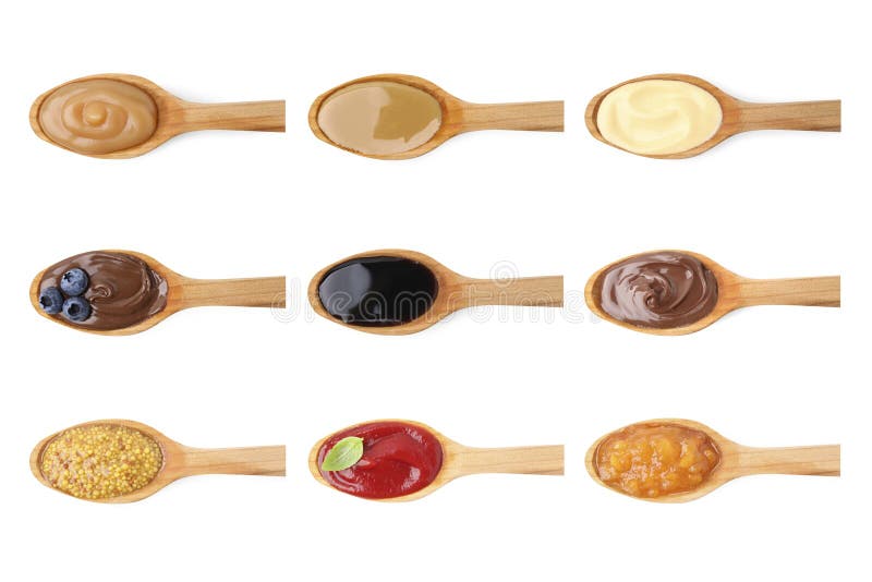 Set of Spoons with Different Food Isolated on White, Top View Stock ...