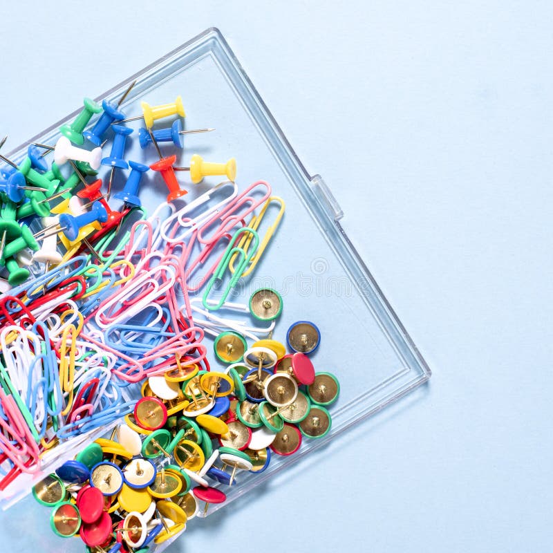 A Set of Stationery Made of Multi-colored Buttons and Paper Clips in a ...