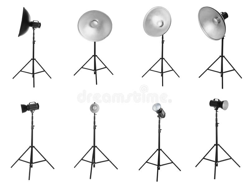 Set with Studio Flash Lights with Reflectors on Tripods Against White ...