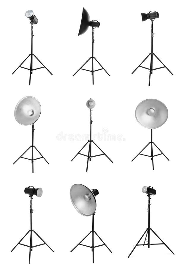 Set with Studio Flash Lights with Reflectors on Tripods Against White ...