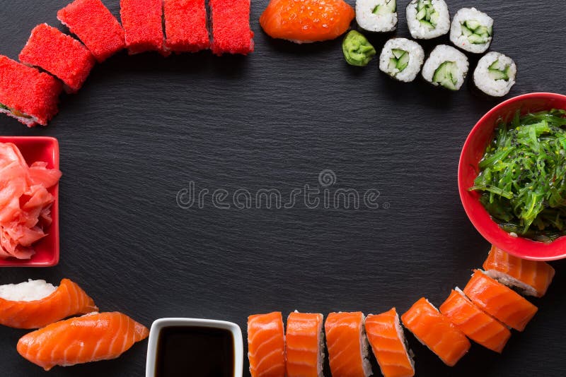 Set of Suchi and Rolls on a Slate Table Stock Image - Image of white ...