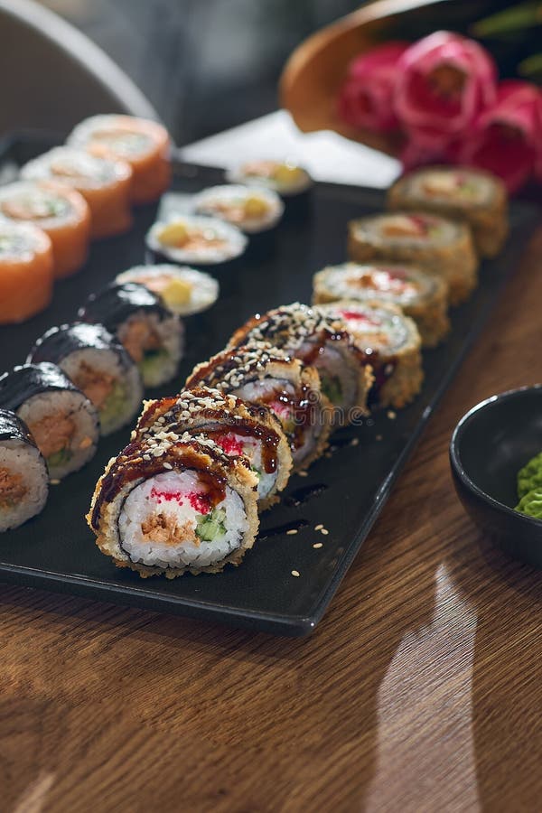 Set of Sushi in a Restaurant on the Table. Sushi Menu Stock Image ...