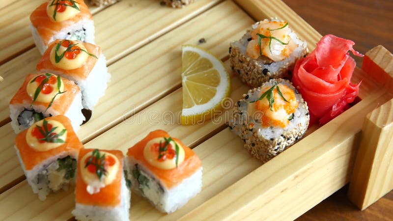 Set Sushi Set. Hand with Chopsticks for Sushi Stock Photo - Image of ...