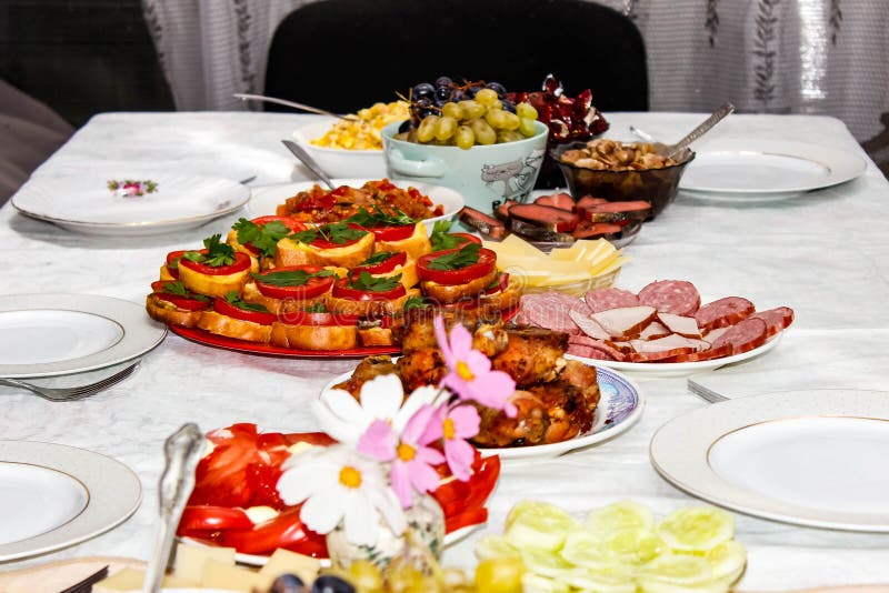 A Set Table with Prepared Dishes before a Family Feast Stock Image ...