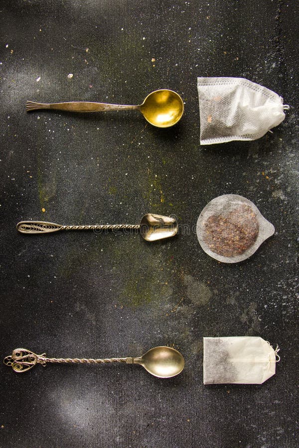 Set of Tea on the Vintage Silverware Spoons, Various of Tea and Teabags ...