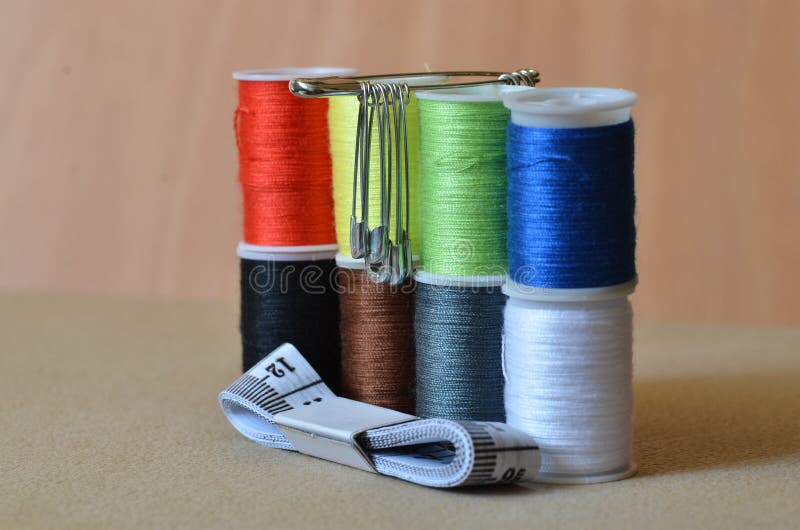 Set of threads with pins stock image. Image of design - 126950111