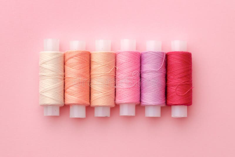 Two Spools of Pink Thread with Needle Stock Photo - Image of point ...