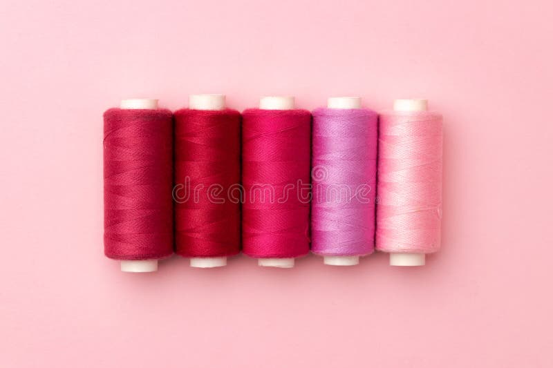 Two Spools of Pink Thread with Needle Stock Photo - Image of point ...