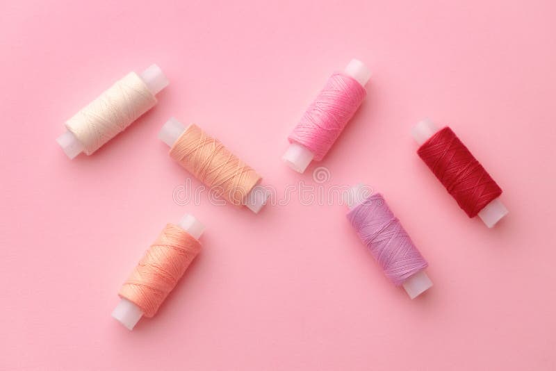 Two Spools of Pink Thread with Needle Stock Photo - Image of point ...