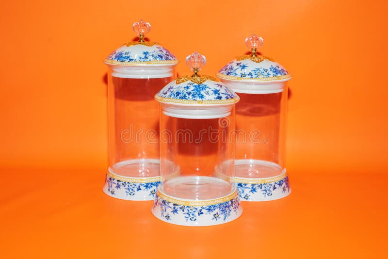 Set of Three Glass Jars with Blue Flower Pattern White Lids Stock Image ...