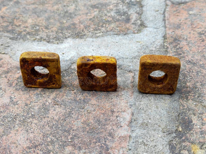 A Set of Three Square Bolts Standing Stock Photo - Image of closeup ...