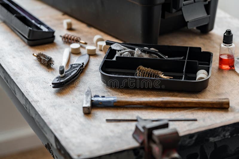Set of Tools for Cleaning and Repairing Weapons in Workshop Stock Photo ...