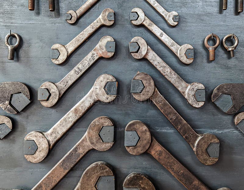 Set of Tools Fastened on a Wooden Plank Stock Image - Image of metallic ...