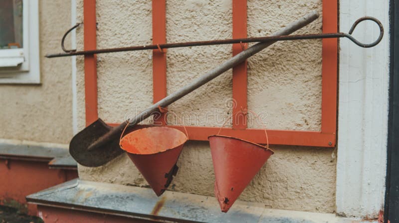A Set of Tools for a Fire Fighting are on the Wall of a Building ...
