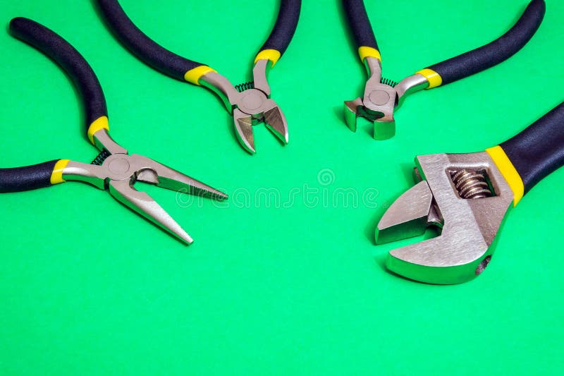 Set of Tools for Master Plumber or Electrician on Green Background ...