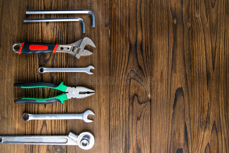 Set of Tools Over a Wood Panel with Space for Text. Top Views with ...
