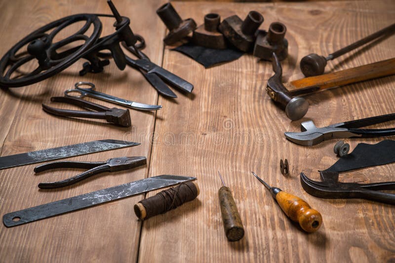 Old tools of the shoemaker stock image. Image of bench - 27087971
