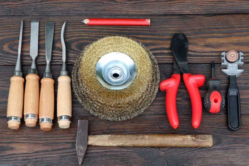 Set of Tools on a Wooden Background.Tools for Different Work ...