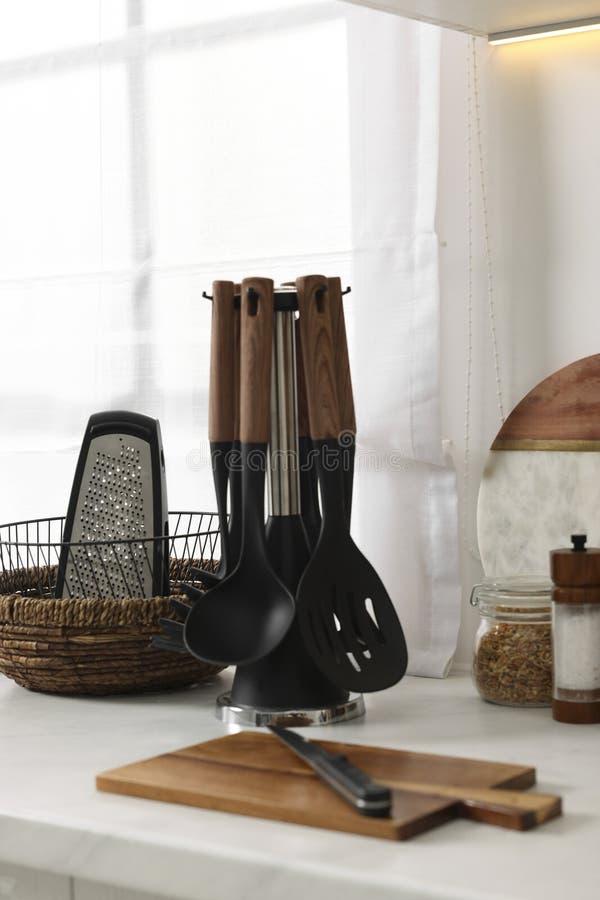 Set of Different Utensils on Countertop in Kitchen Stock Image - Image ...