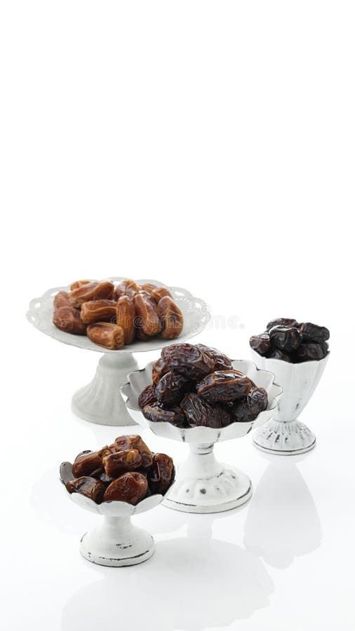 Set of Various Dates in Cake Stand, Isolated on White Background. Copy ...