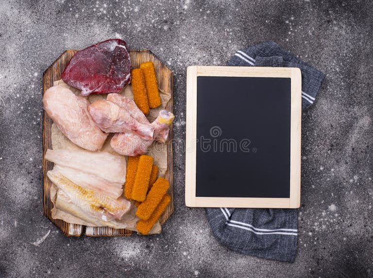 Set of Various Frozen Meat and Fish Stock Photo - Image of chalkboard ...