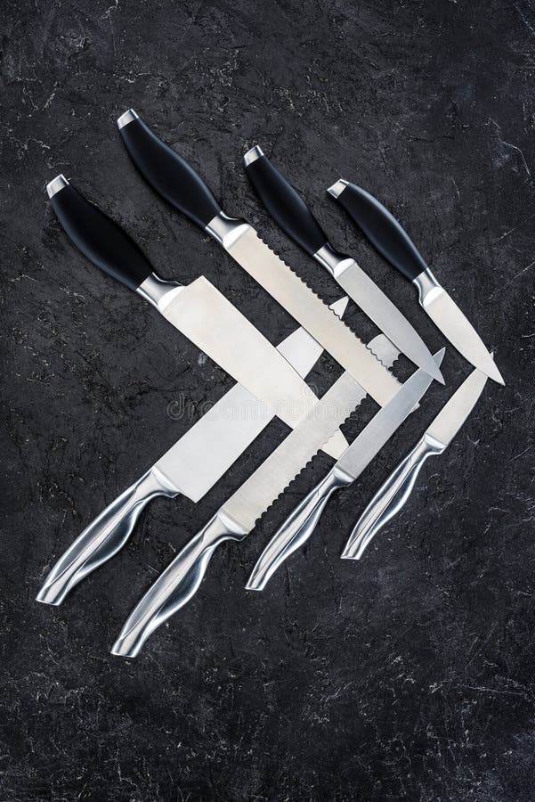 Set of Various Kitchen Knives Arranged on Black Surface Top View Stock ...