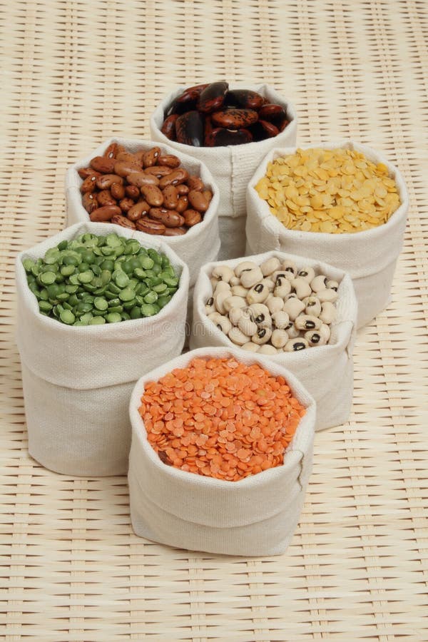 Various Pulses in Traditional Wooden Pots, Red Lentils and Cooking Oil ...