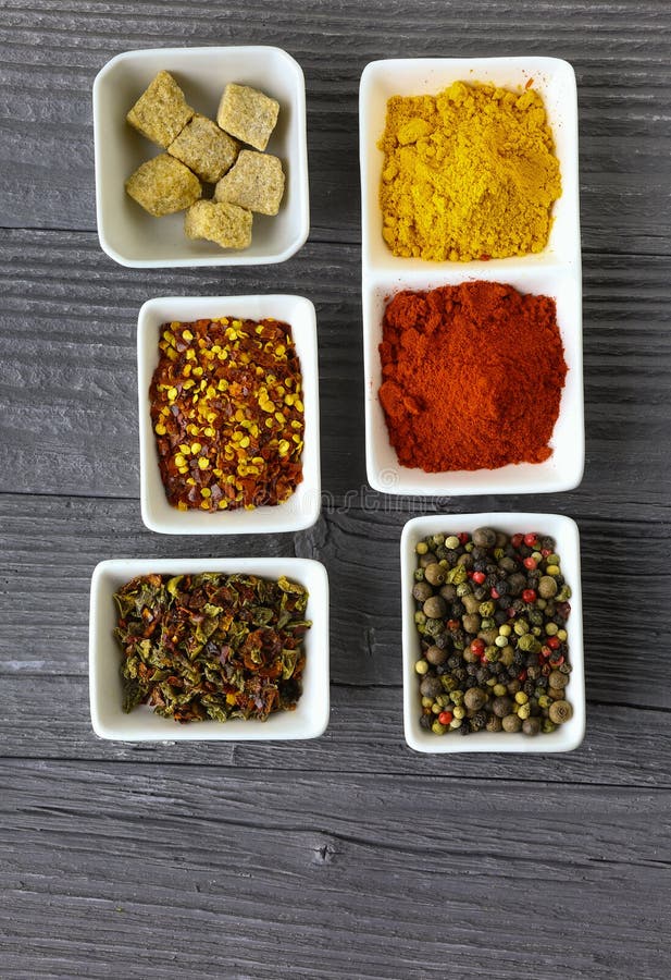 Set of Various Spices on Black Stone Table. Top View Stock Photo ...