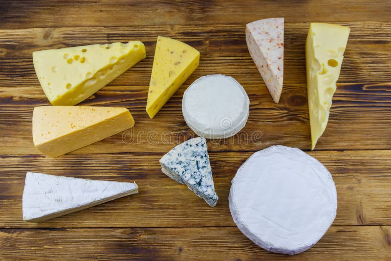 Set of Various Types of Cheese on Wooden Table. Top View Stock Photo ...