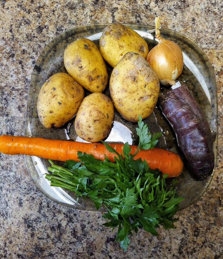 Set of Vegetables on Plate on Kitchen Table Stock Image - Image of ...