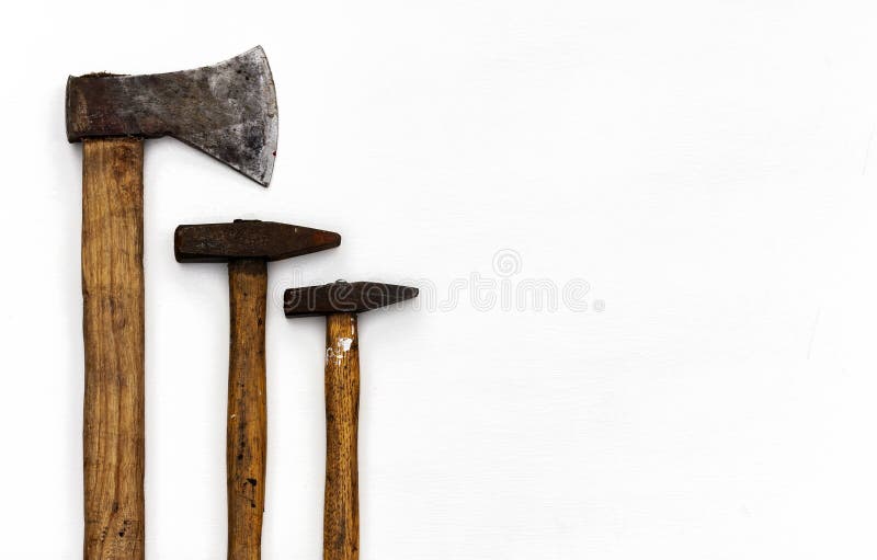 Set of Vintage Hand Construction Tools on a White Wooden Background ...