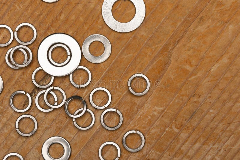 Set of Washers on a Wooden Base Stock Photo - Image of maintenance ...