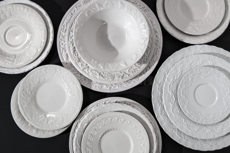 Set of White Ceramic Textured Plates Stock Photo - Image of empty, cook ...