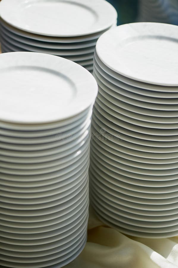 Set of White Dishes on White.Stack of Plates Stock Image - Image of ...