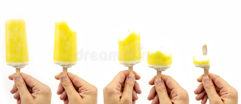 Set of White Vanilla Ice Cream on Stick with Yellow Fruit Glaze in a ...