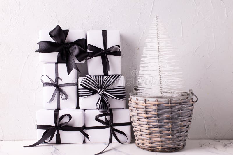 Set of Wrapped Boxes with Presents and Decorative White Christmas Tree ...