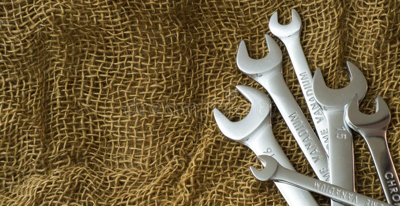 Set of Wrenches Tools on Dark Brown Wool Flat Lay Stock Photo - Image ...