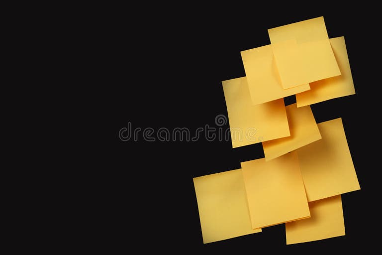 Set of Yellow Folded Note Paper Sheets on Black Background Stock Photo ...
