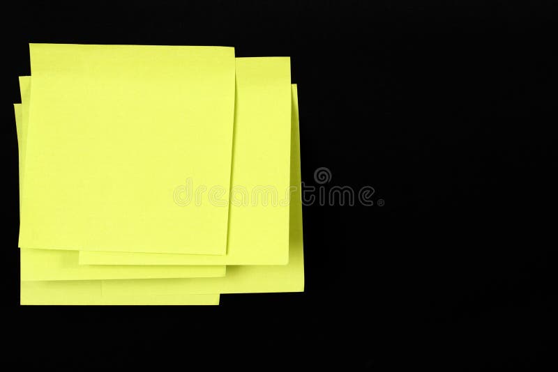 Set of Yellow Folded Note Paper Sheets on Black Background Stock Photo ...