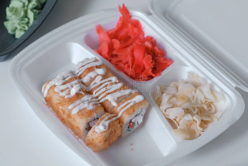 Sets of Rolls in Plastic Packaging on the Kitchen Table. Stock Photo ...