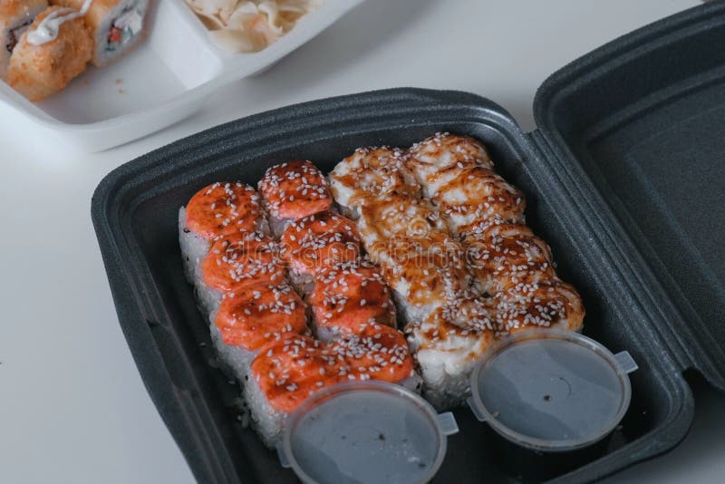 Sets of Rolls in Plastic Packaging on the Kitchen Table. Stock Photo ...