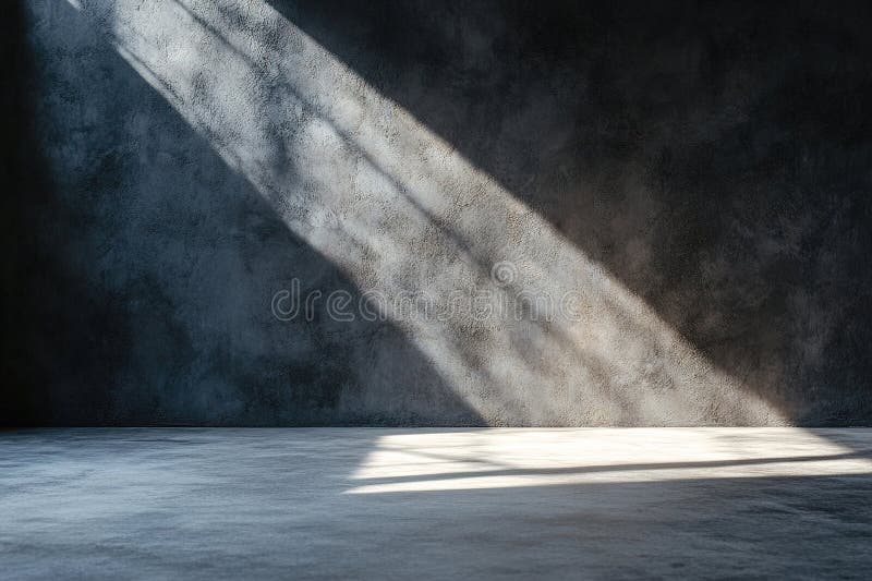 This Setting Features a Moody Concrete Surface Illuminated by a Single ...