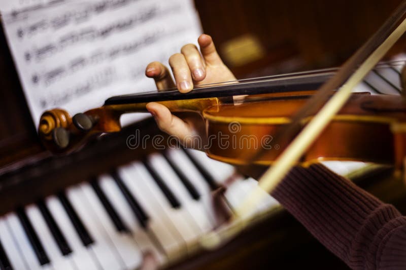 Setting the Hand at the Violinist Learning a Piece, Violin Stock Image ...