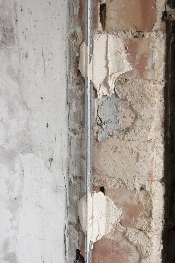 Setting the Level for Plastering Walls. Beacons on Plaster Mortar Stock ...