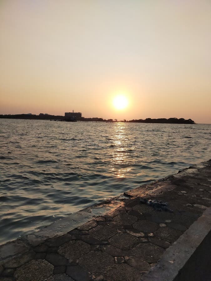 The Setting Sun Adds To the Beauty Around the Beach Stock Image - Image ...