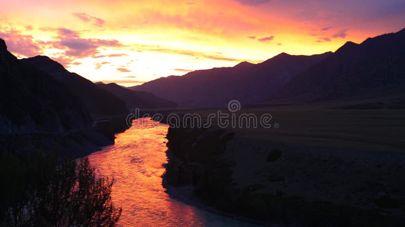 Breathtaking Sunset Over Serene Mountain River Landscape with Dramatic ...