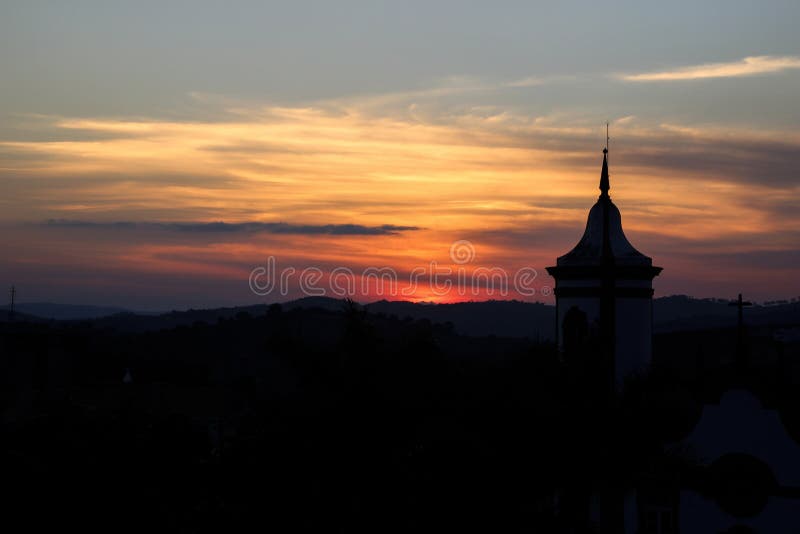 Setting Sun with Church Tower Stock Photo - Image of west, scenario ...