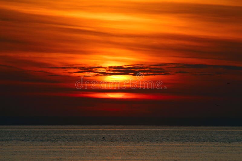 The Setting Sun in the Clouds Stock Image - Image of calm, brilliant ...