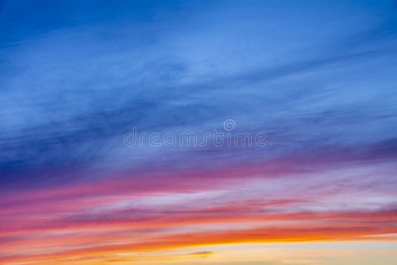 The Setting Sun in a Colored Sky. Stock Photo - Image of dramatic ...