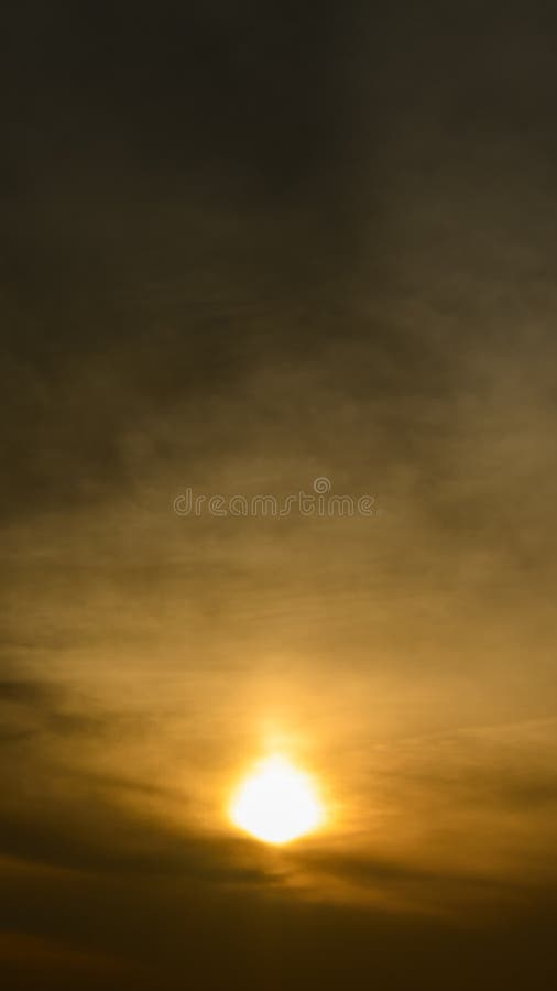 Setting Sun in Atmospheric Haze. Warm Sunset Back Light. 16:9 Vertical ...